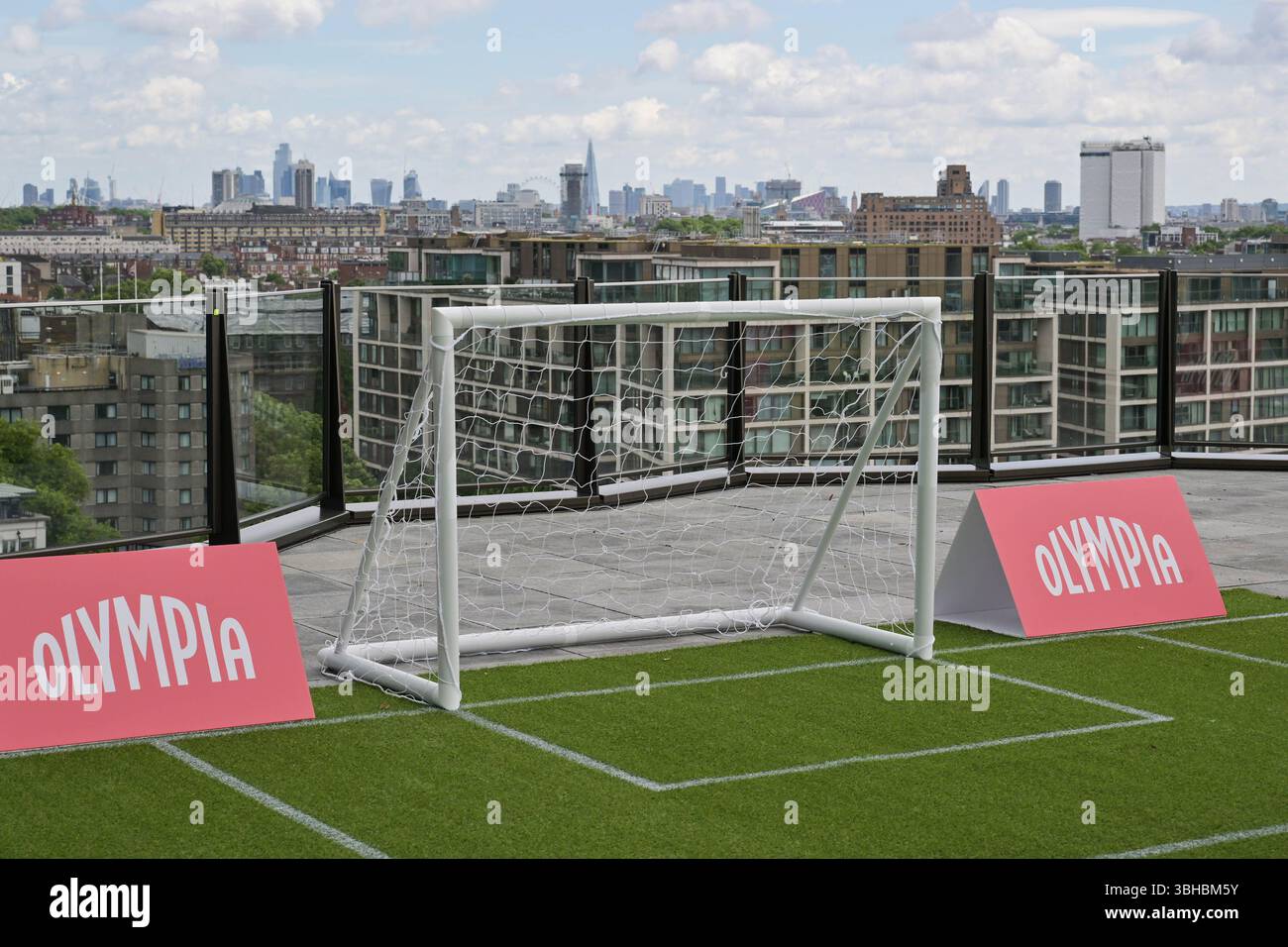 EDITORIAL USE ONLY A football pitch is installed on a roof terrace at ...