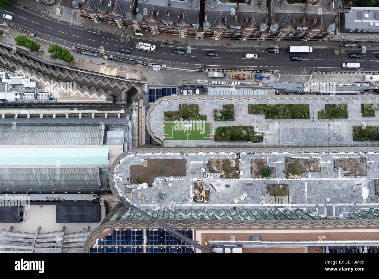 EDITORIAL USE ONLY A football pitch is installed on a roof terrace at ...