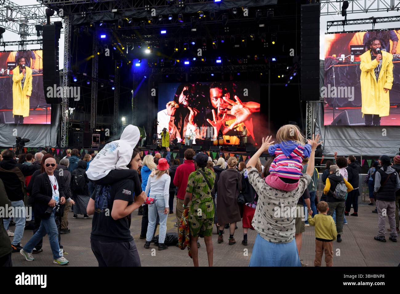 A bass guitarist with the band 'Steam Down' plays on the main stage at ...