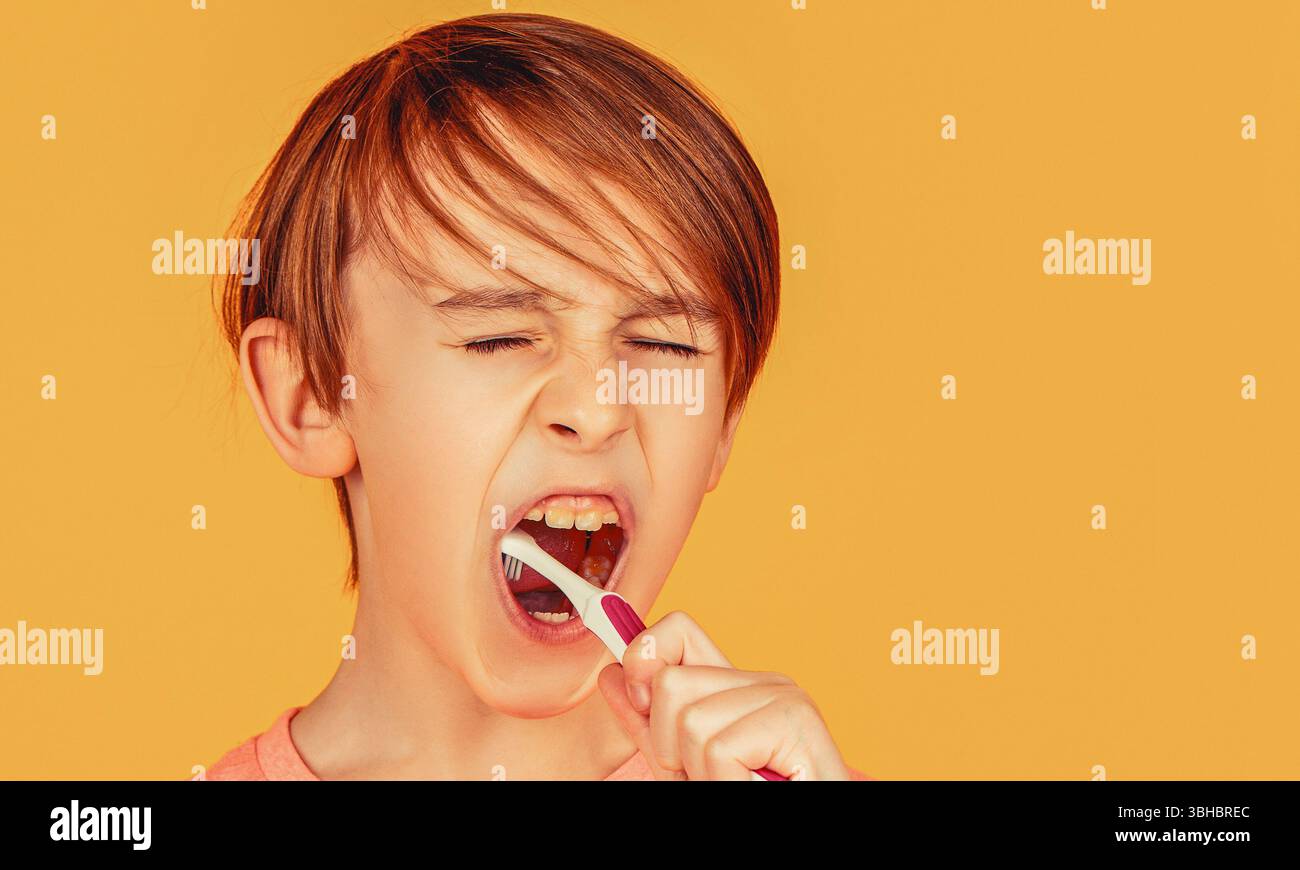 Boy brushing his teeth. Oral hygiene with toothbrush and toothpaste ...