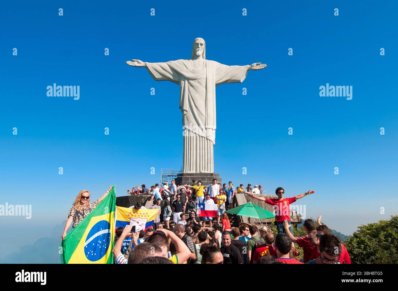 A crowd of people at Christ the Redeemer statue on Corcovado mountain ...