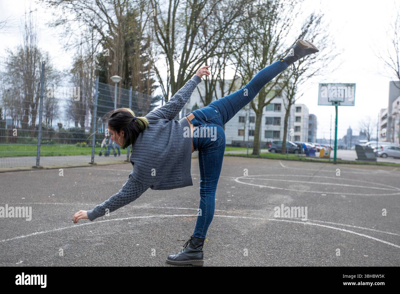 Flexible street dancer practicing freestyle dance Stock Photo - Alamy