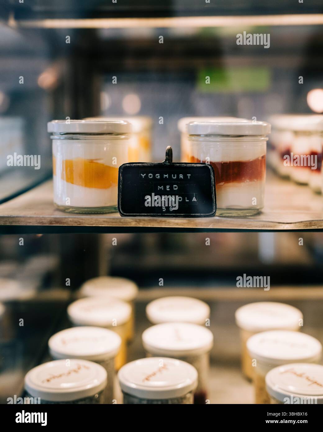 sign saying yoghurt and granola in jars a cafe in Stockholm Sweden ...