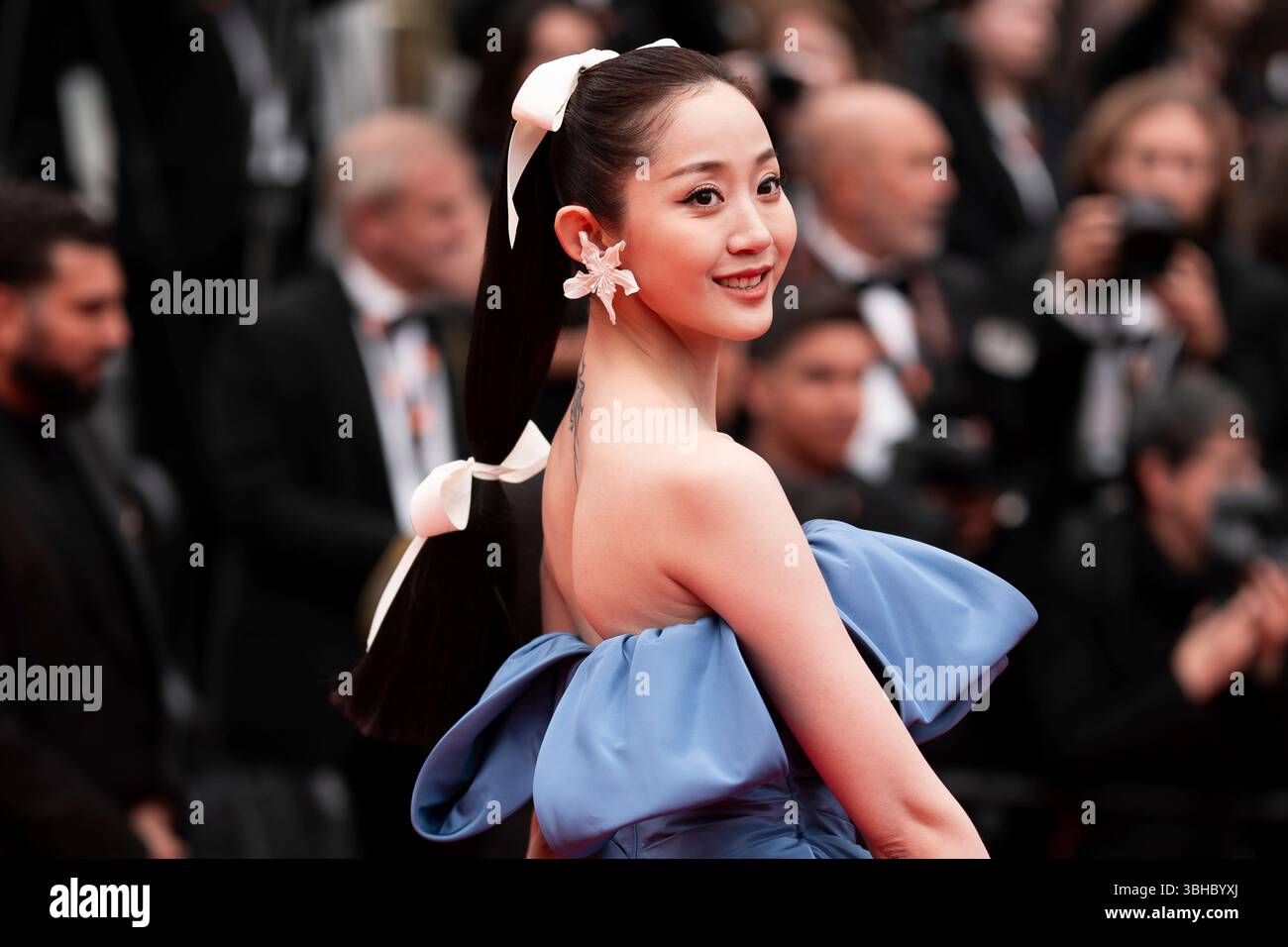 Wan QianHui poses for photographers upon arrival at the premiere of the film 'Eddington' at the ...