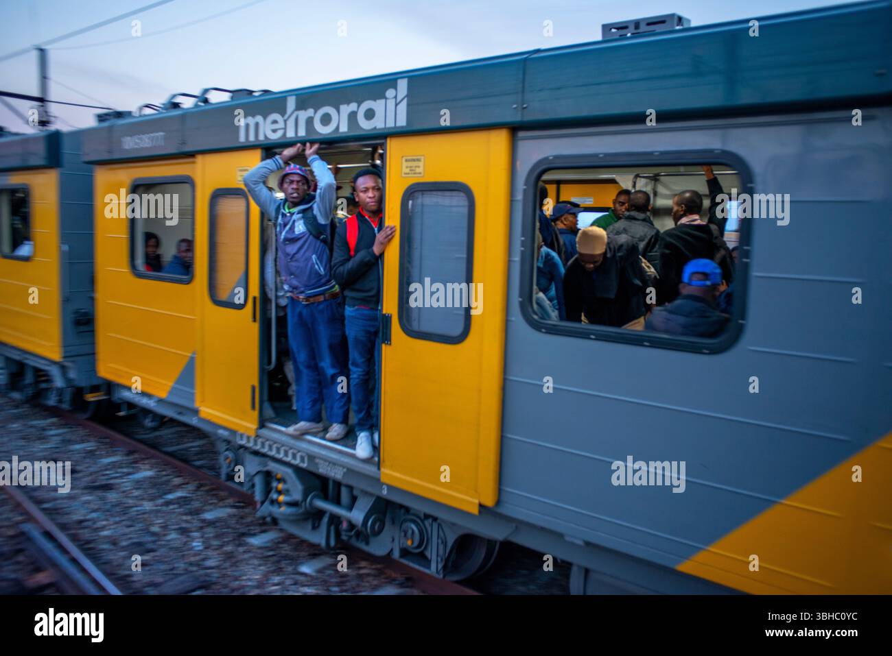 Metrorail train arrives at the station, in the southern suburbs train ...