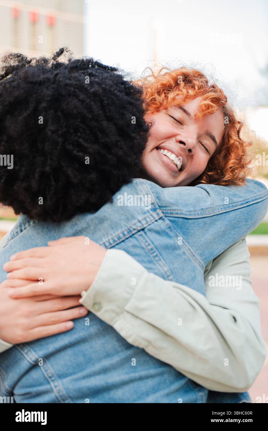 Touching moment two friends sharing hi-res stock photography and images ...