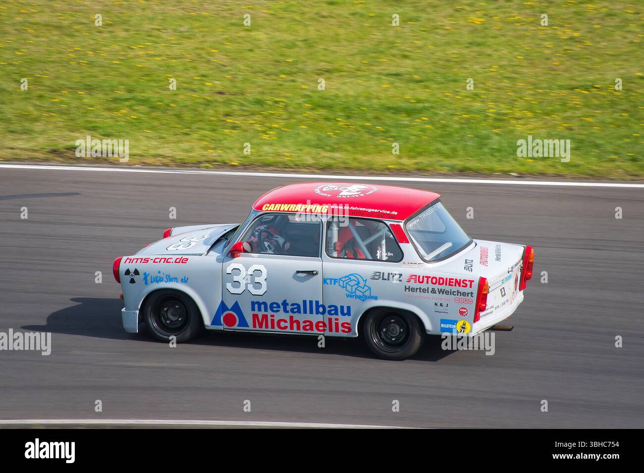 Most, Czech Republic – A vintage Trabant 601 race car speeding around ...