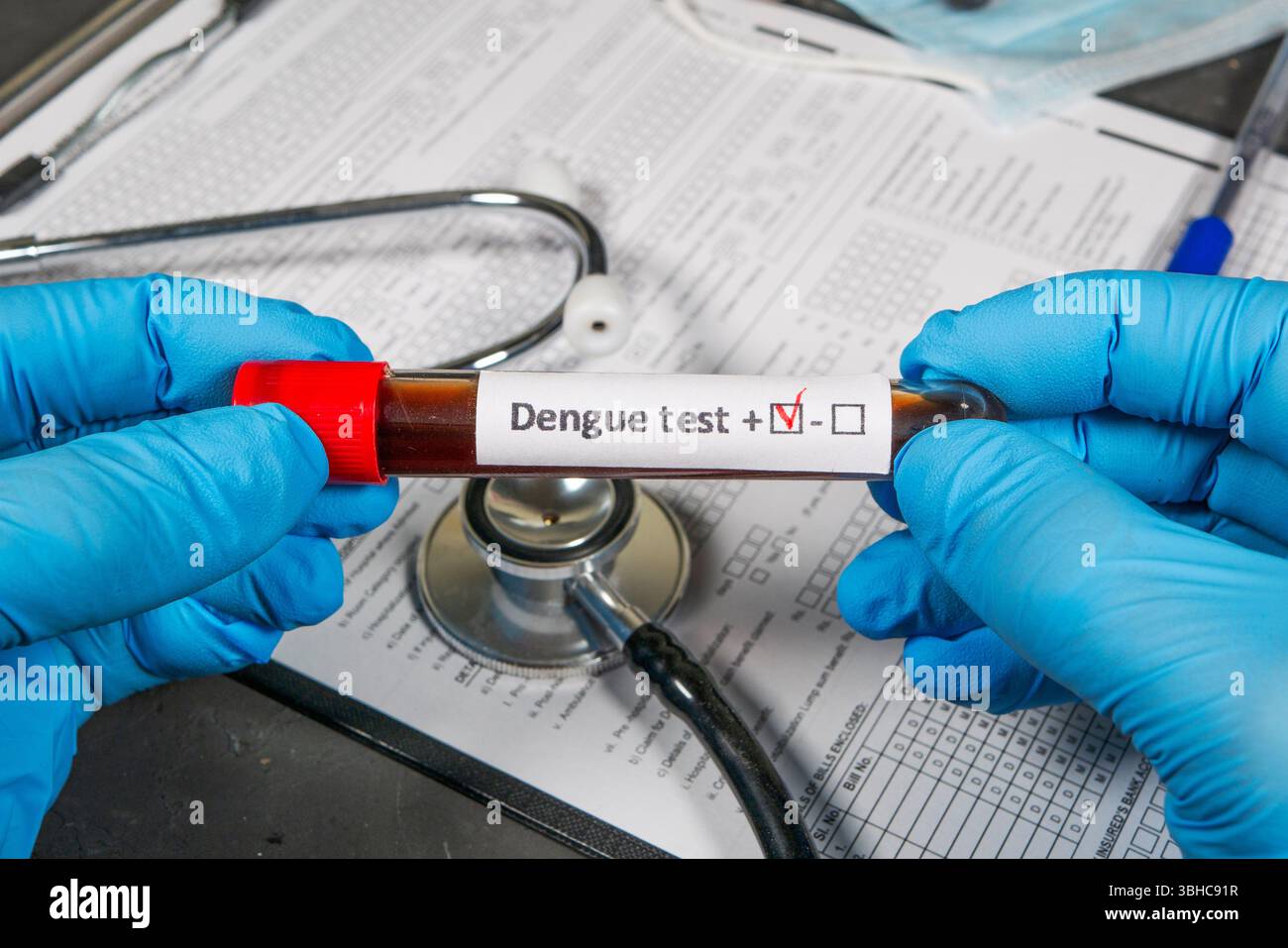 Dengue fever test doctor holding hi-res stock photography and images ...