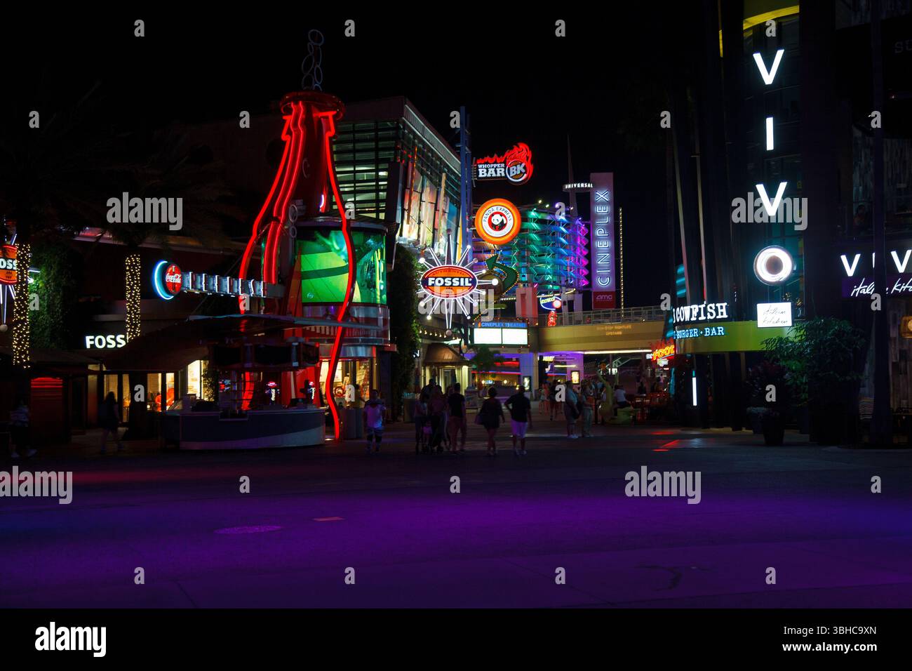 The Universal Citywalk shops and restaurants neons at night, Universal ...