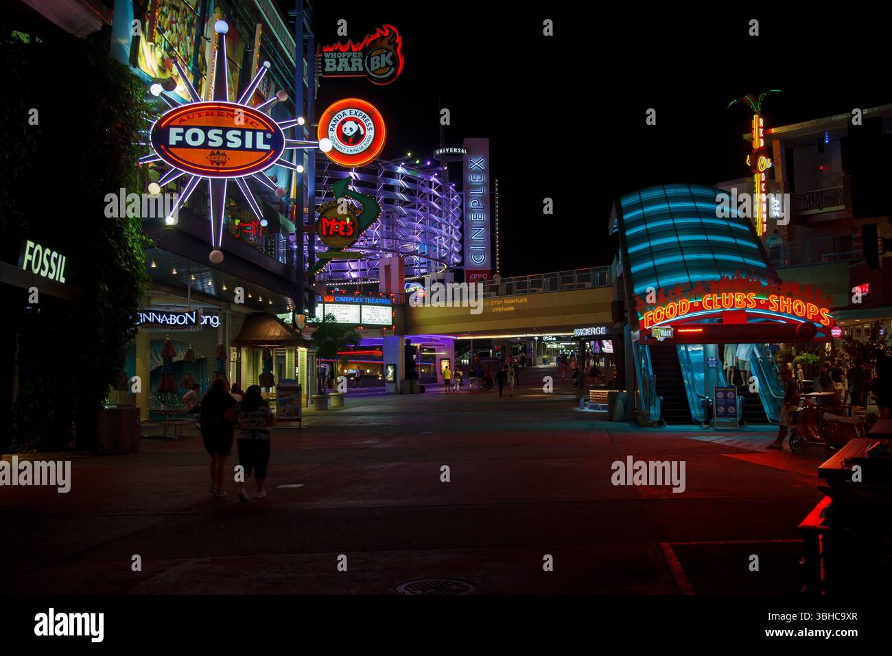 The Universal Citywalk shops and restaurants neons at night, Universal ...