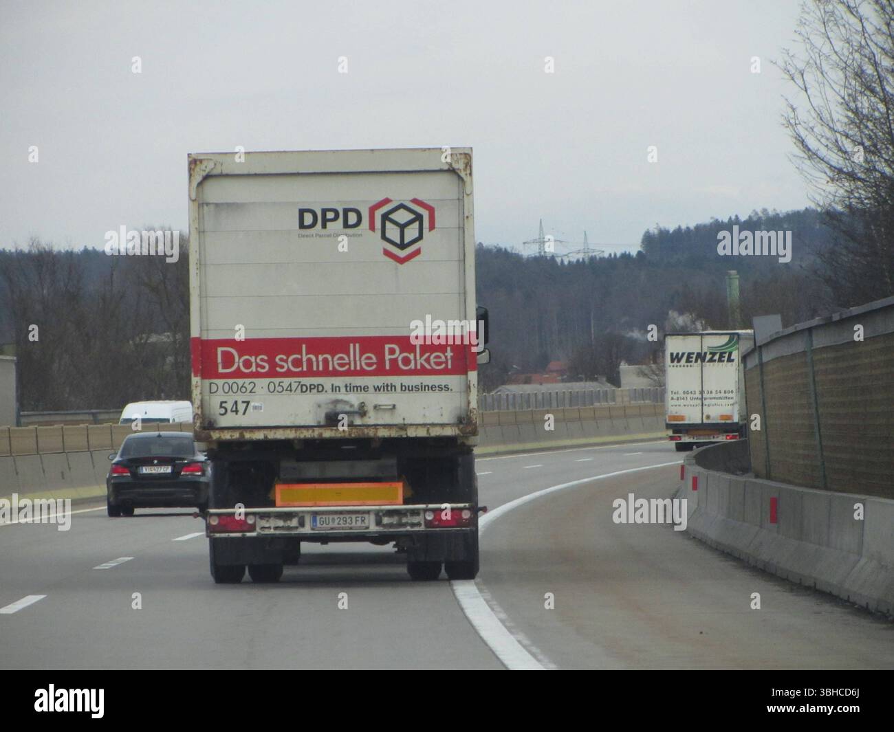 a DPD truck on the street delivering mail and parcels DPD truck ...