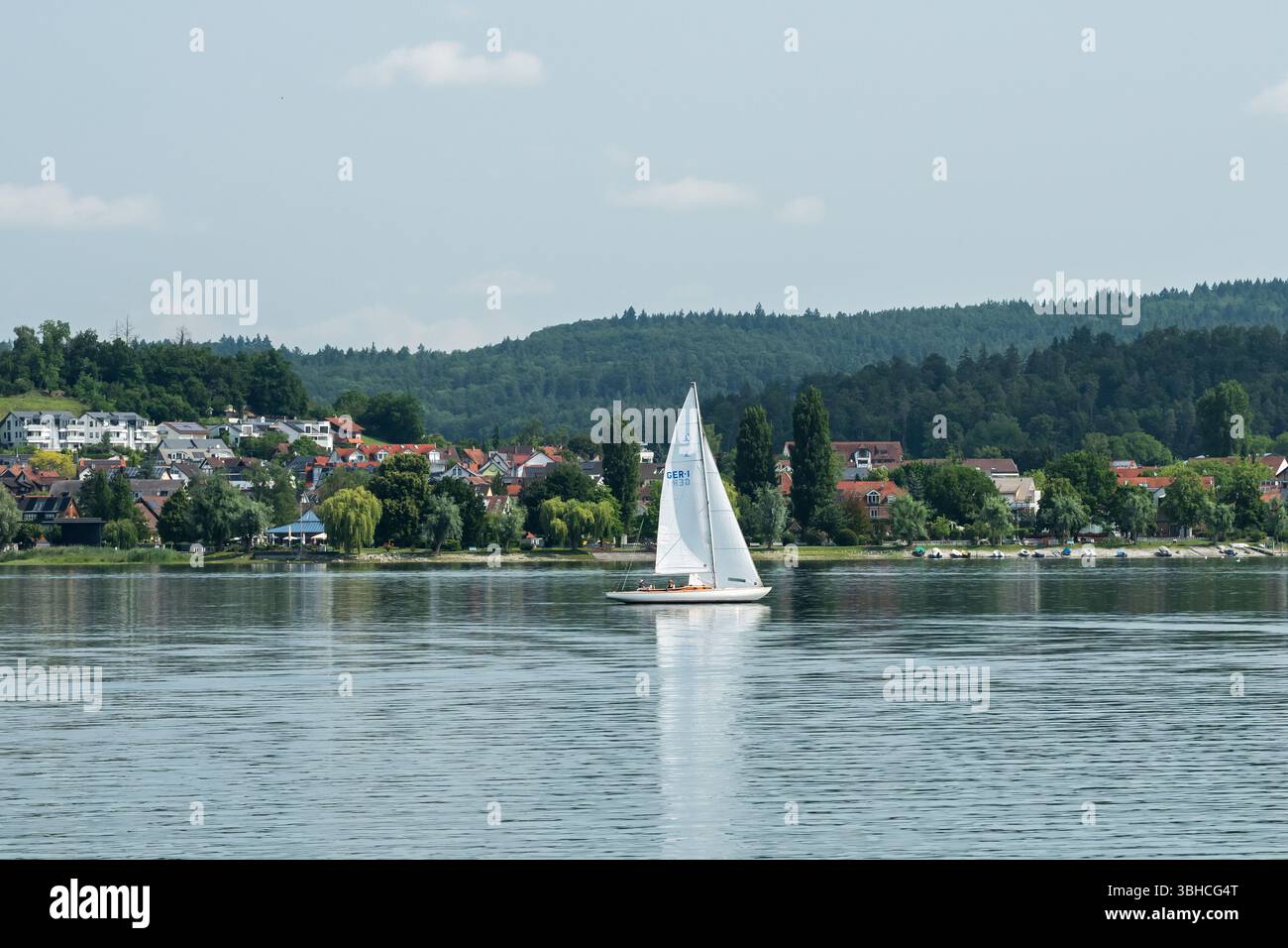 Reichenau, Germany. 09th June, 2025. A sailing boat sails on Lake ...