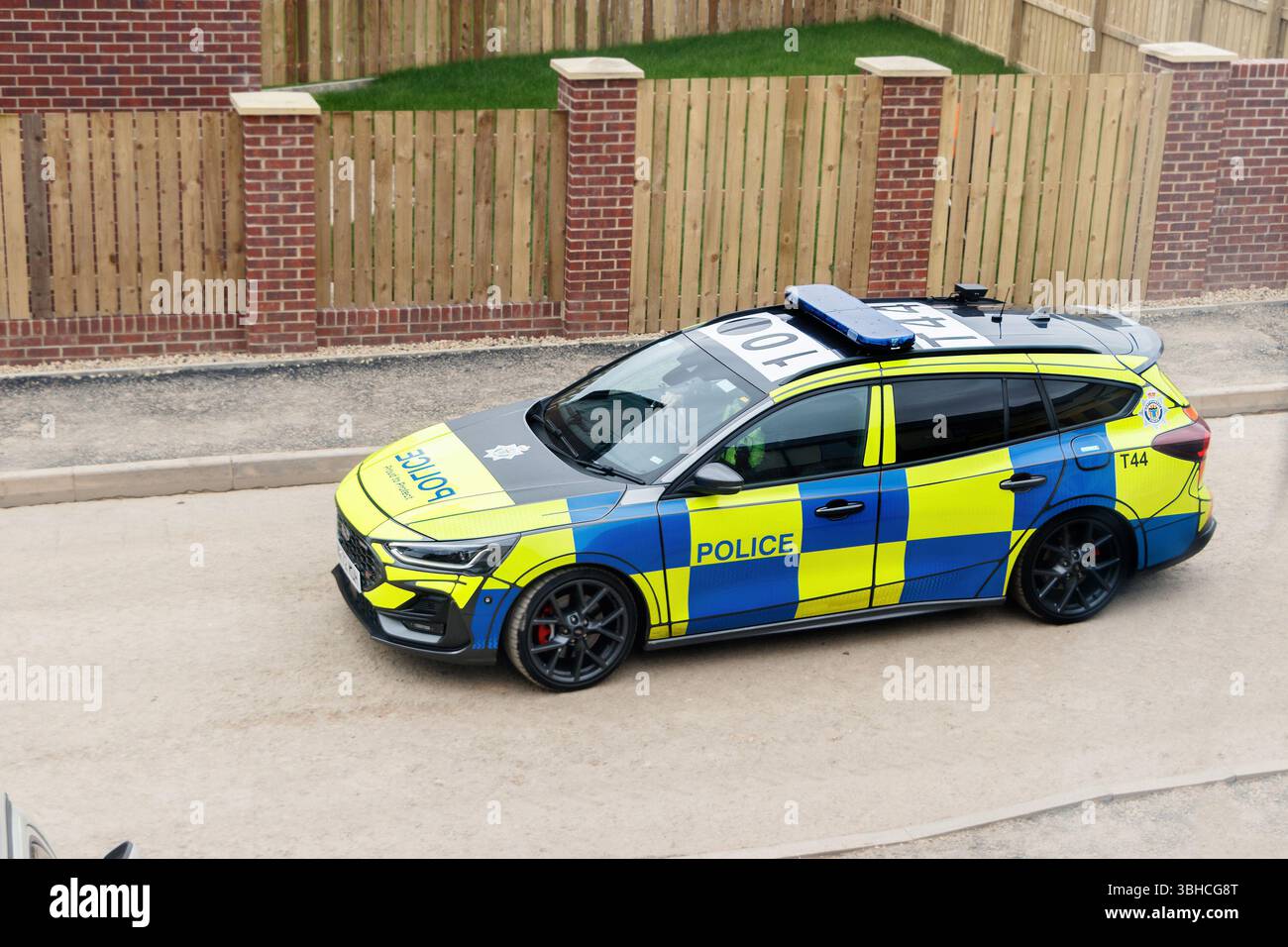 Aerial view of a modern northumbria police car with blue and yellow ...