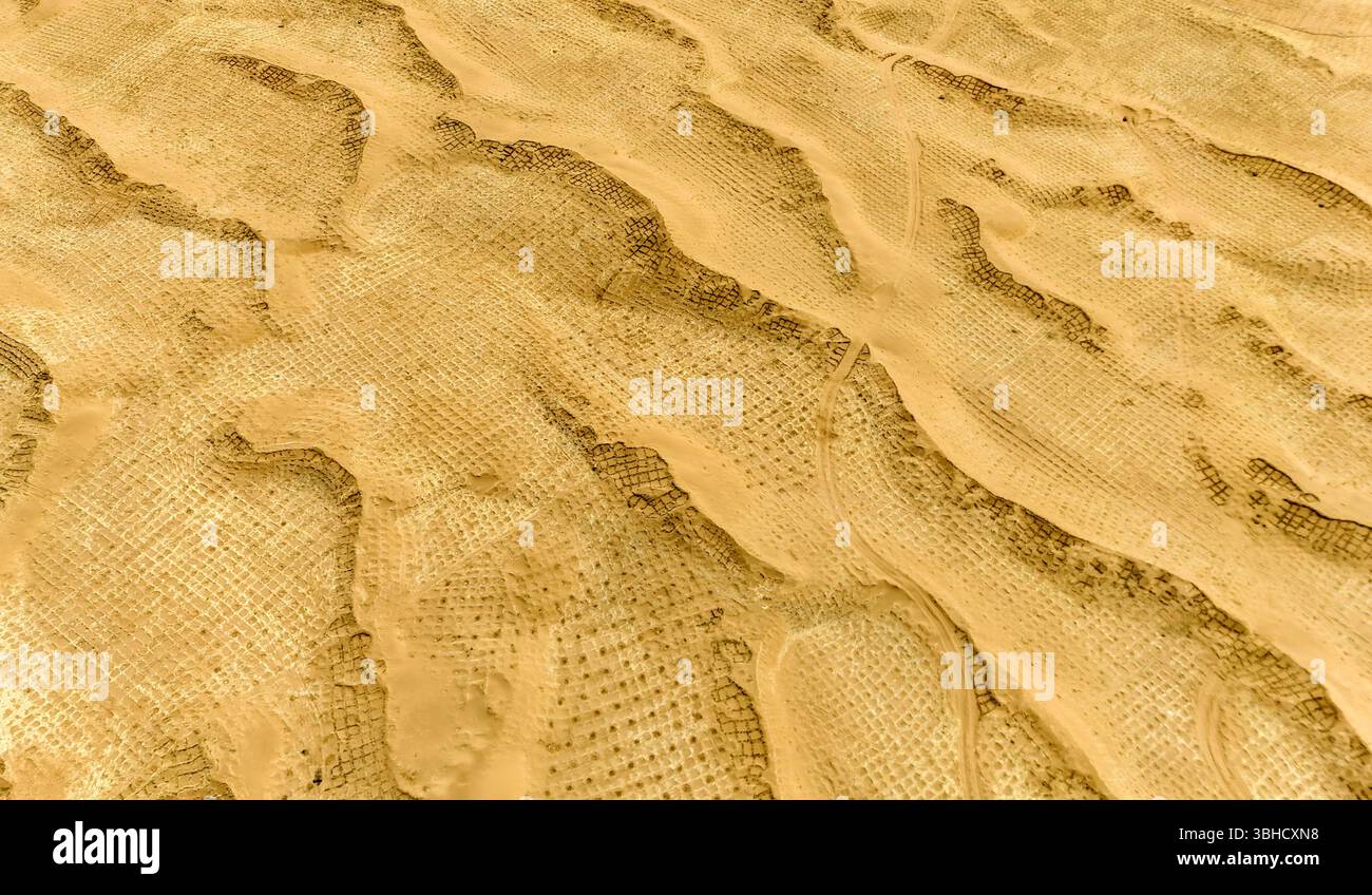 WUWEI, CHINA - JUNE 8, 2025 - Aerial view of the Qingtu Lake sandstorm ...