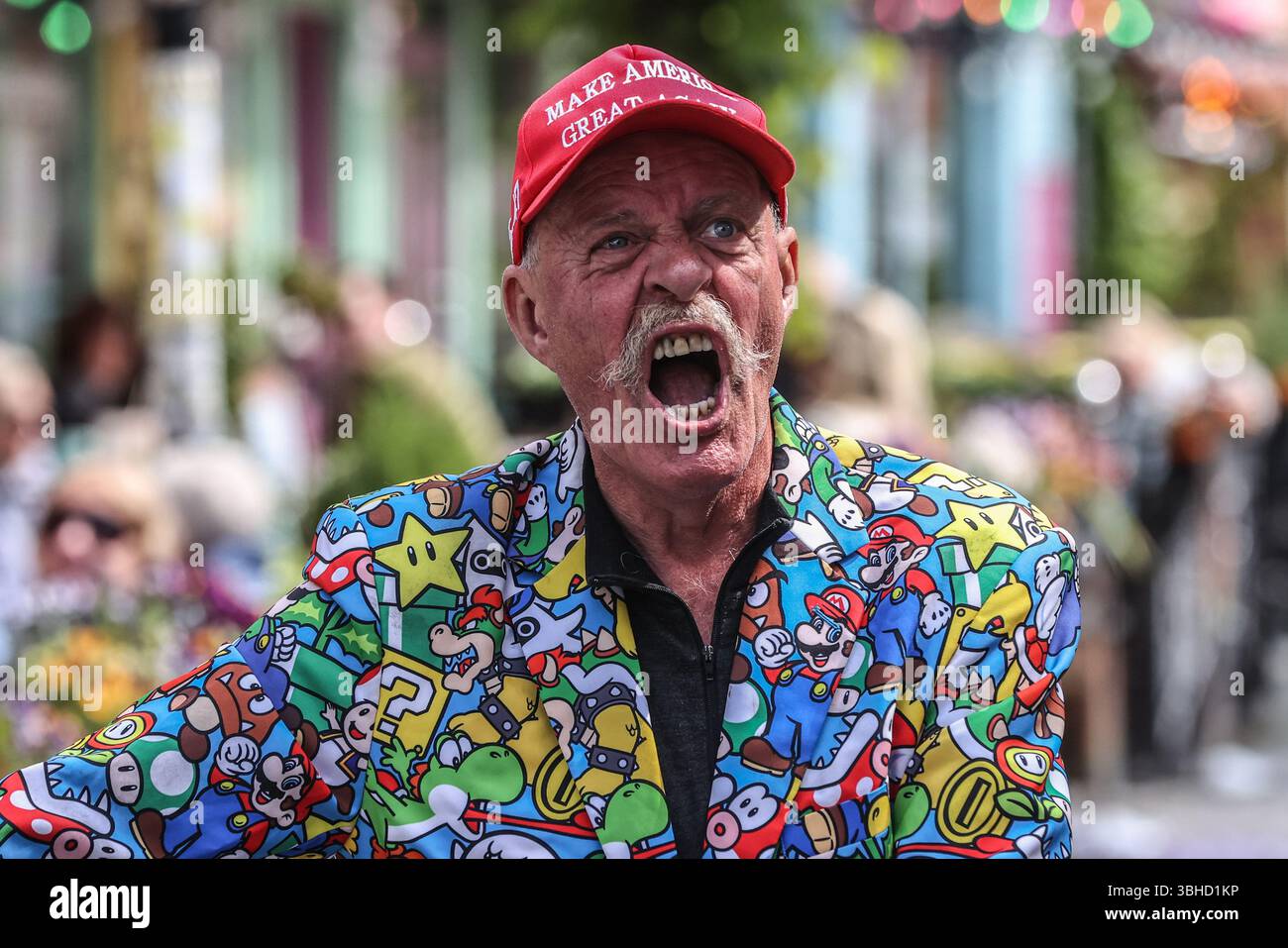 A President Donald trump supporter walks through the streets of ...