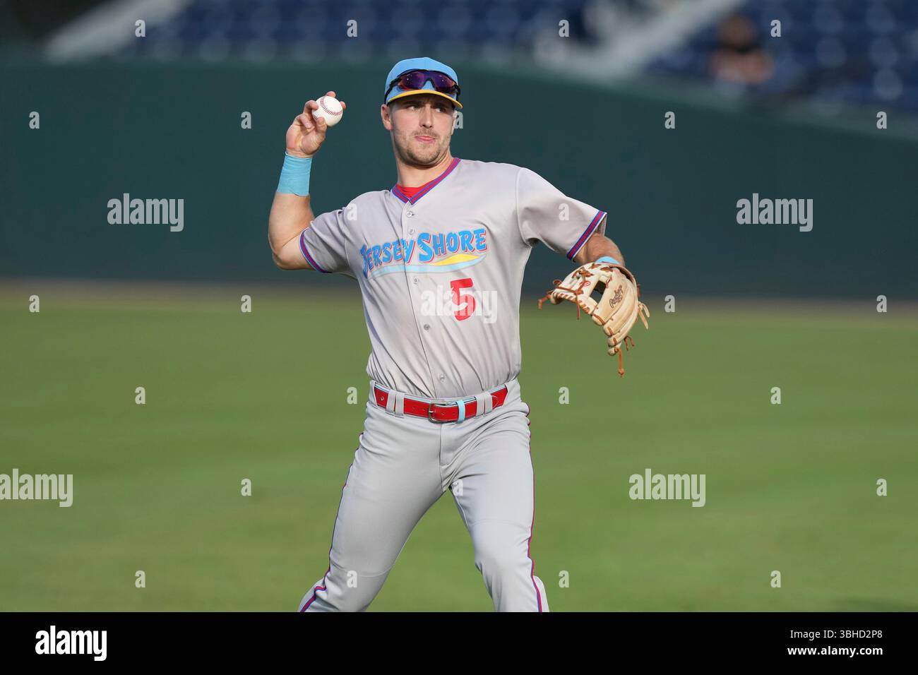 Carson DeMartini (5) of the Jersey Shore BlueClaws warms up before a ...