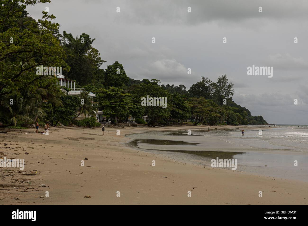 June 9, 2025, Thailand: Tourists walk along Kai Bae beach on Koh Chang ...