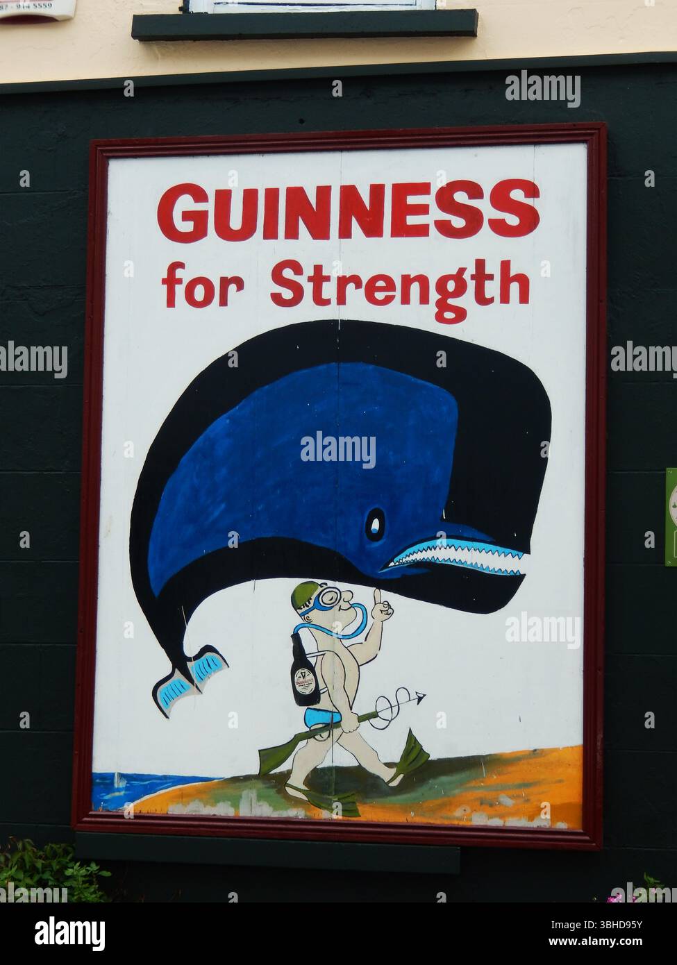 Retro Guinness Strength Advertisement Featuring Whale and Diver ...