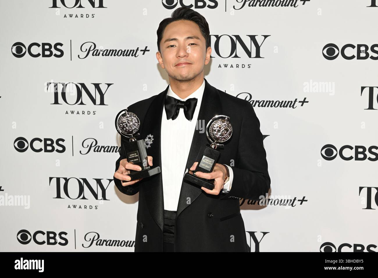 Hue Park poses with the Best Score award and Best Book of a Musical ...