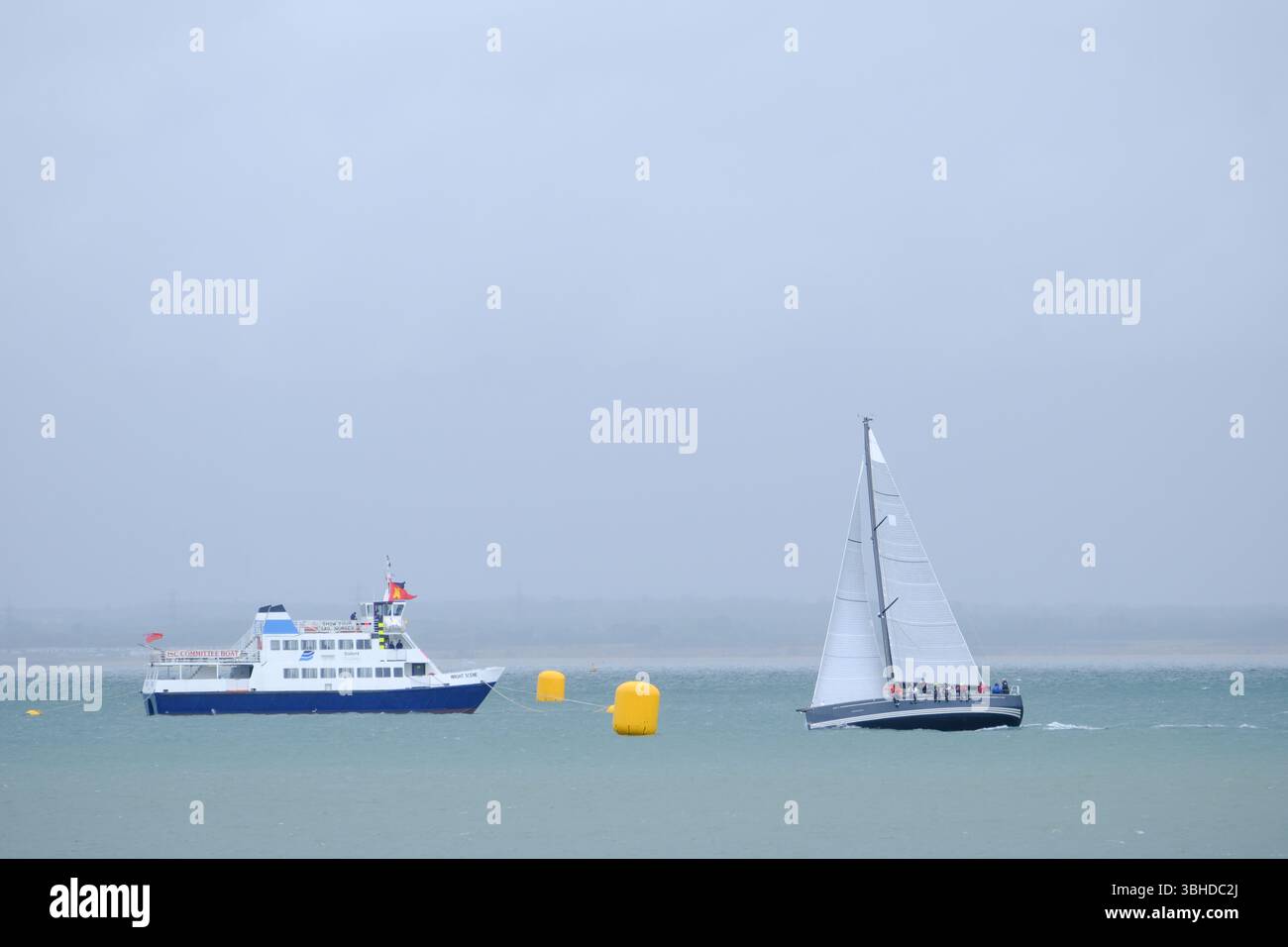 7 JUN 2025 - Cowes, UK - Yachts approaching the finish line at Cowes ...