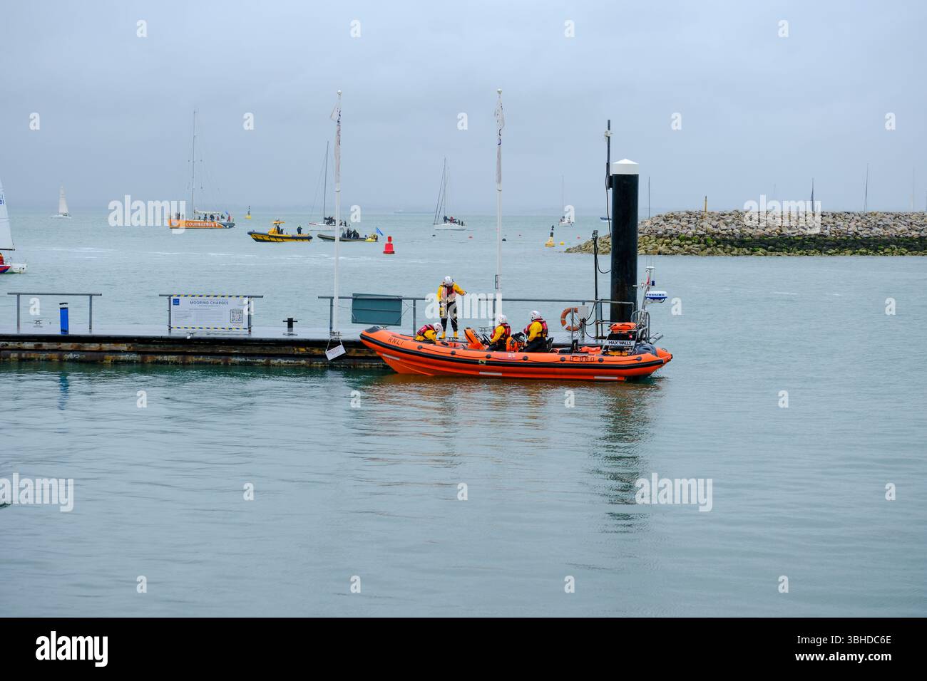 7 JUN 2025 - Cowes, UK - An RNLI coastguard crew in a rescue rib, ready ...
