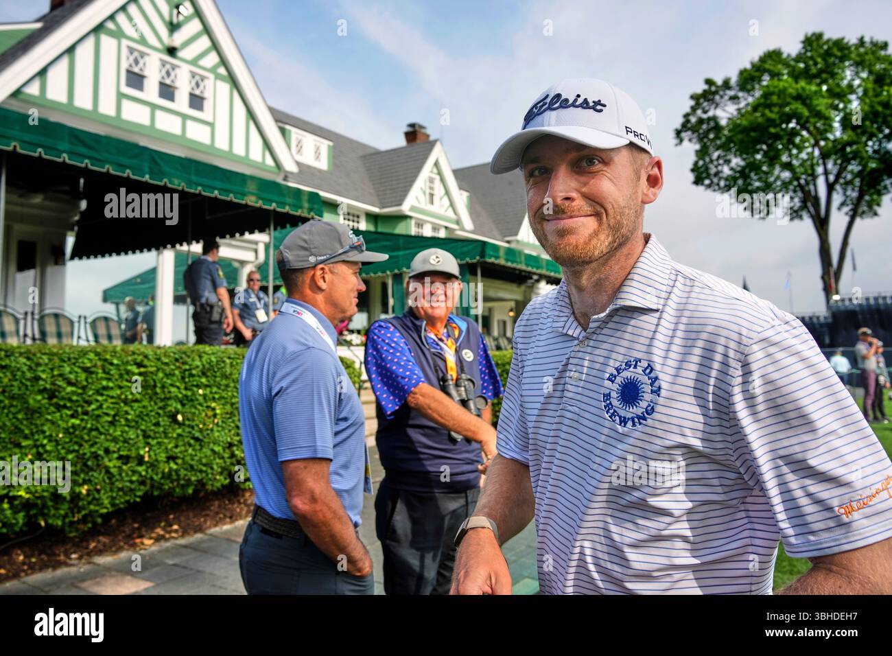 Matt Vogt walks past the clubhouse to the first tee for a practice ...