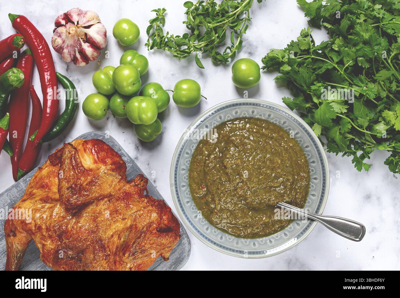 Tkemali sauce, made from green cherry plum, with ingredients on the ...