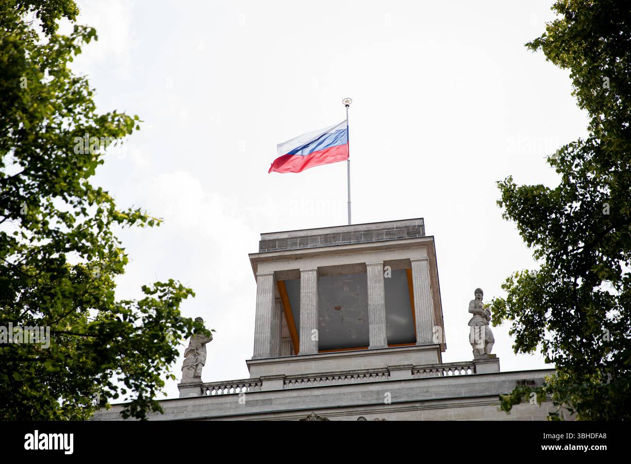 A Russian flag flies atop the Russian Embassy building in Berlin ...