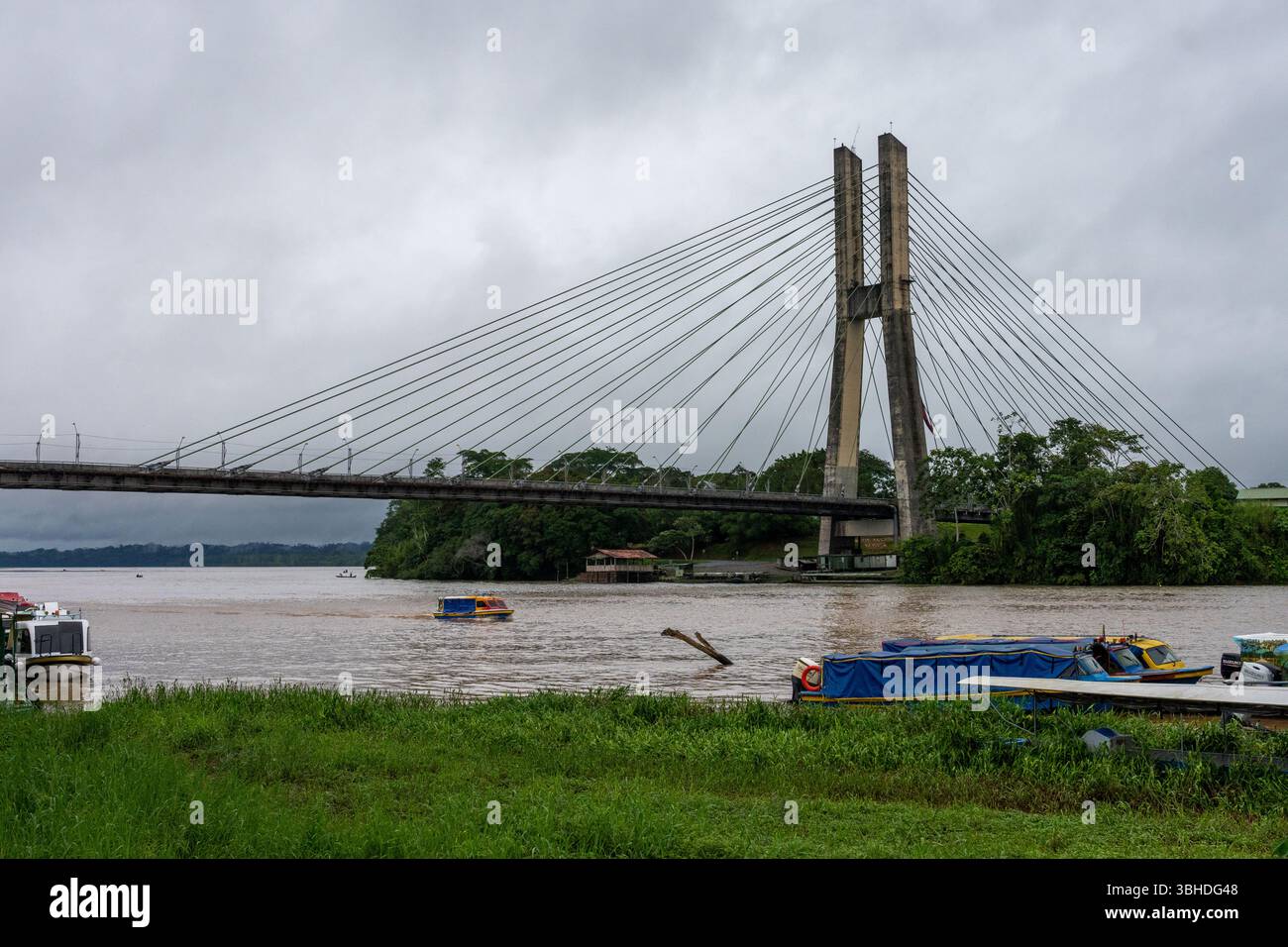 The Napo River Bridge at El Coca in the Amazon Basin of Ecuador. A ...