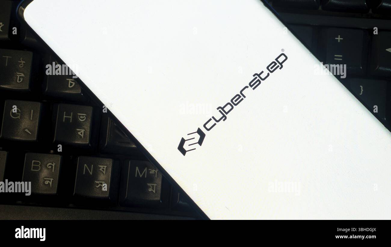 Cyberstep logo on phone with keyboard on dark background Stock Photo ...