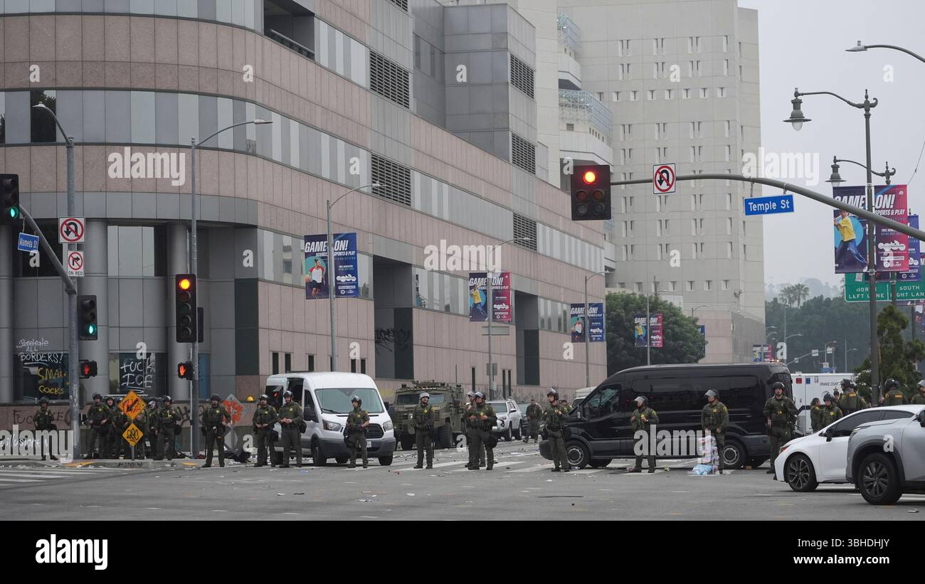 EDS NOTE: OBSCENITY Police officers block a street near the ...