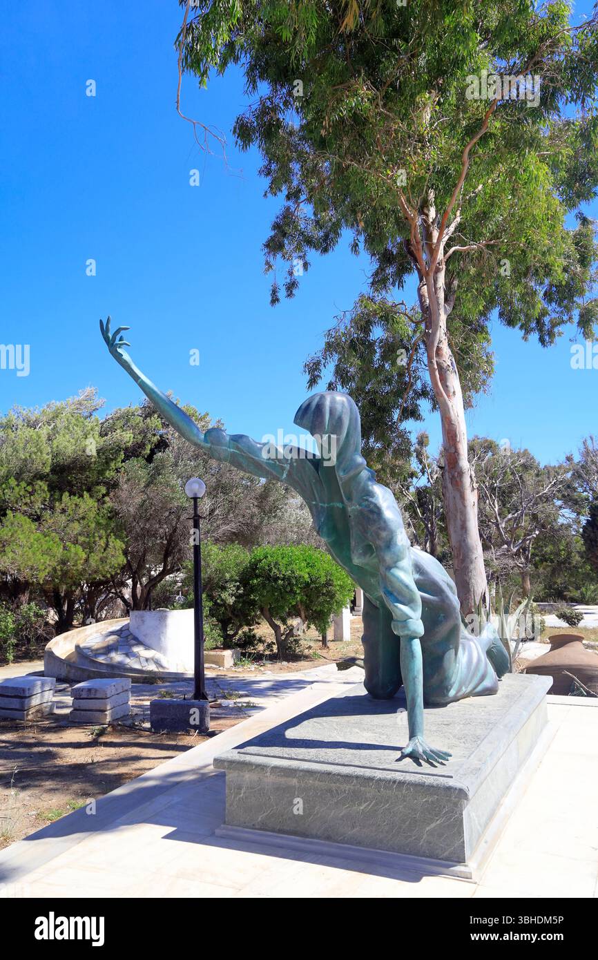 Bronze statue of a figure on hands and knees crawling to the Panagia ...