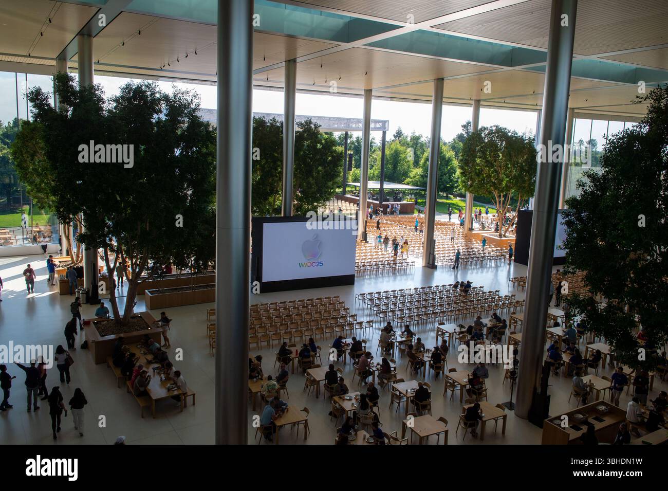 09 June 2025, USA, Cupertino: Participants arrive at the Apple ...