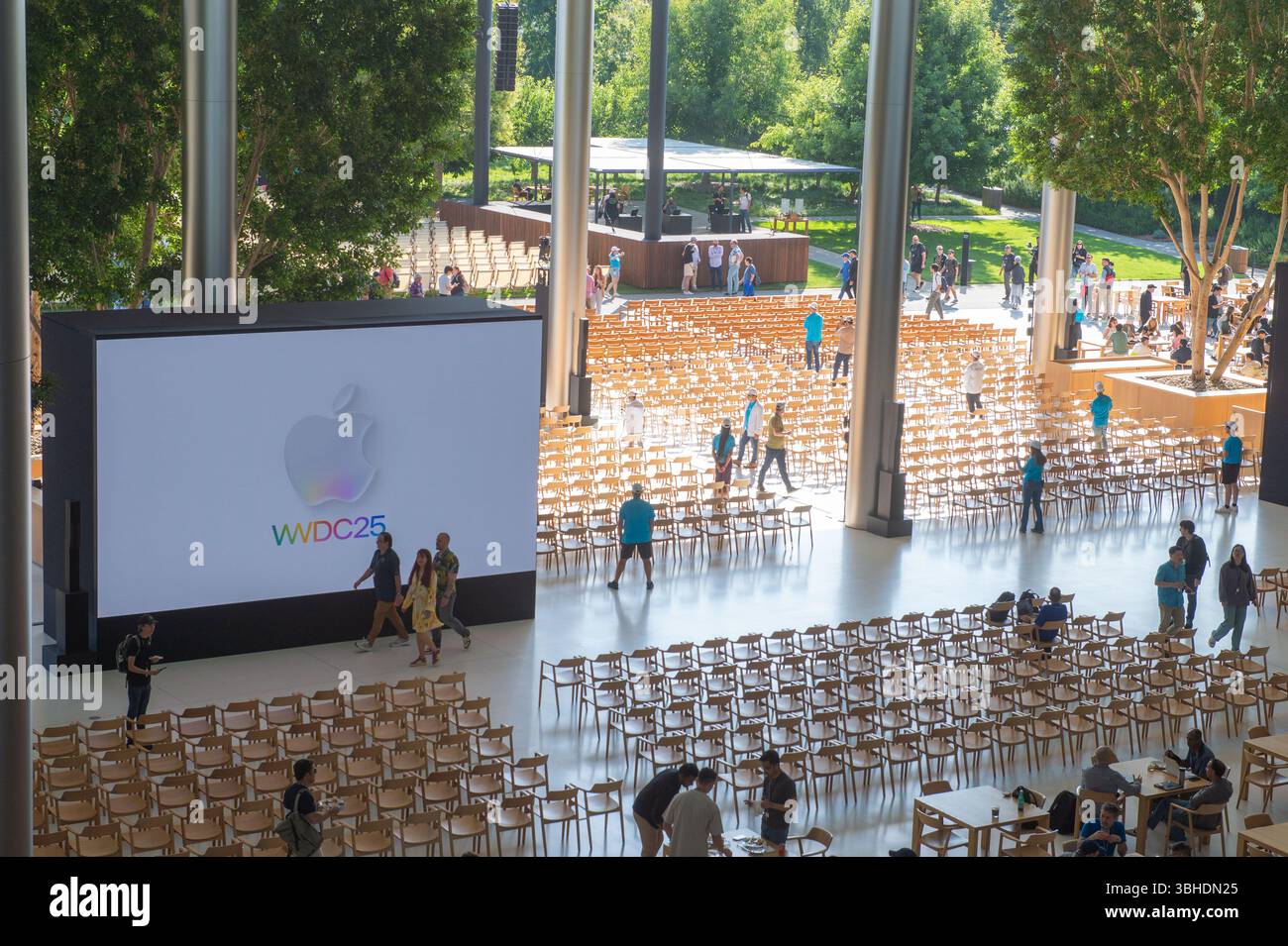 09 June 2025, USA, Cupertino: Participants arrive at the Apple ...