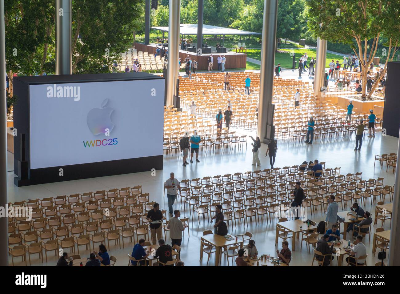 09 June 2025, USA, Cupertino: Participants arrive at the Apple ...