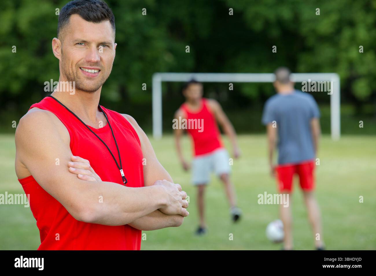 Football coach looking at pitch hi-res stock photography and images - Alamy