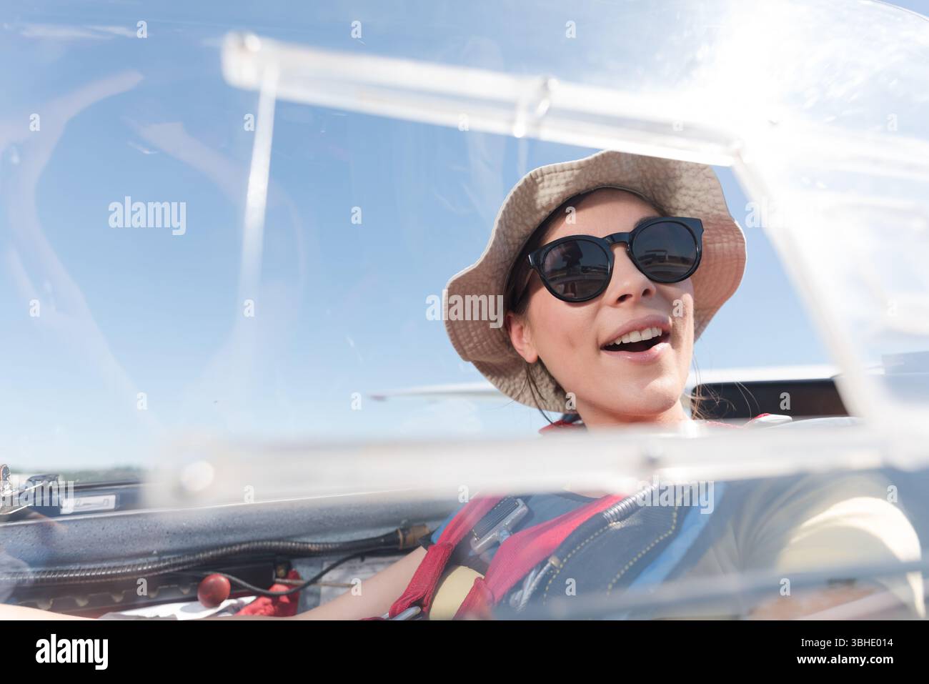 smiling female pilot in the light aircraft cockpit Stock Photo - Alamy