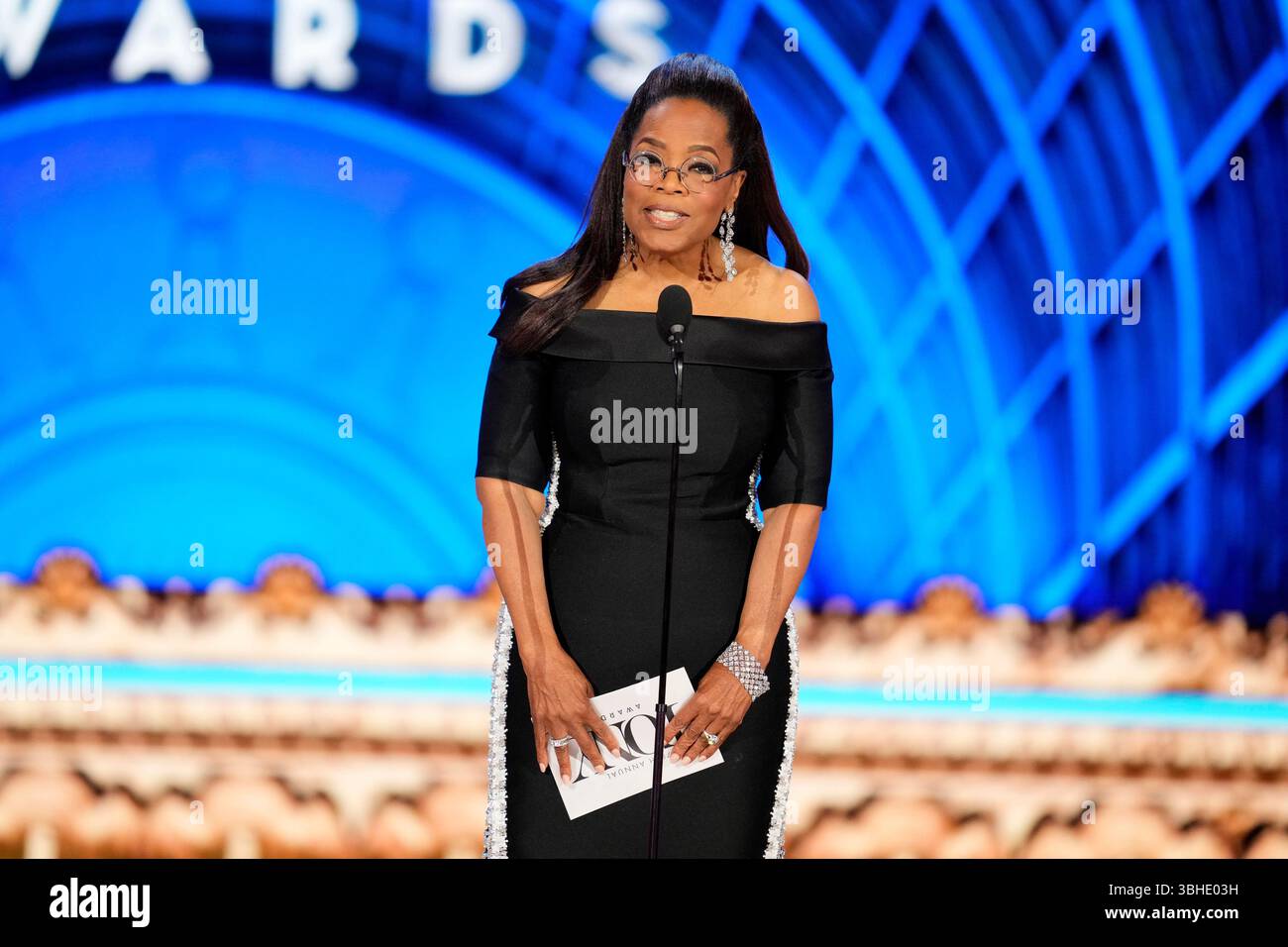 Oprah Winfrey presents the award for best performance by an actress in ...