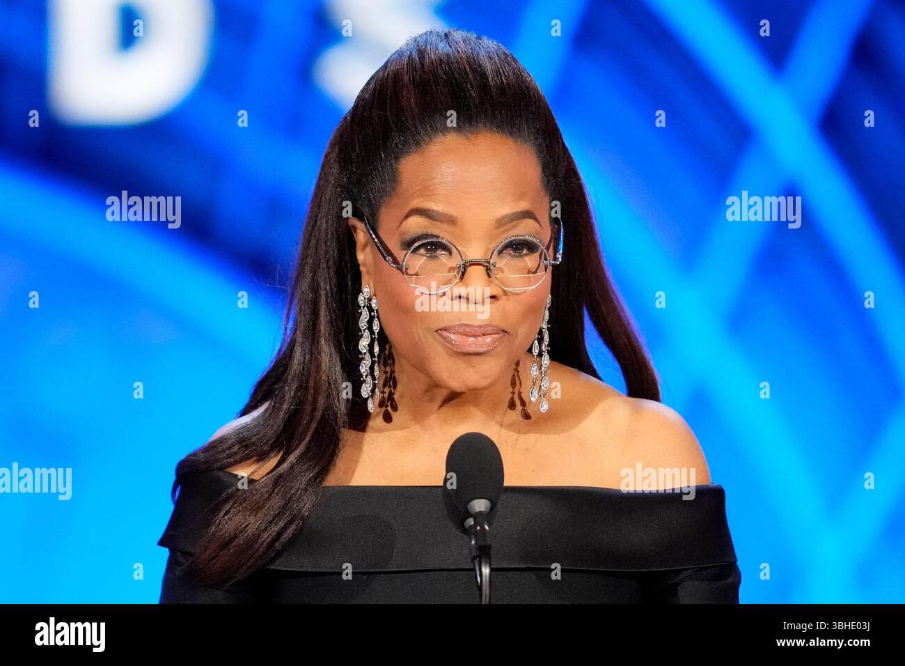Oprah Winfrey presents the award for best performance by an actress in ...