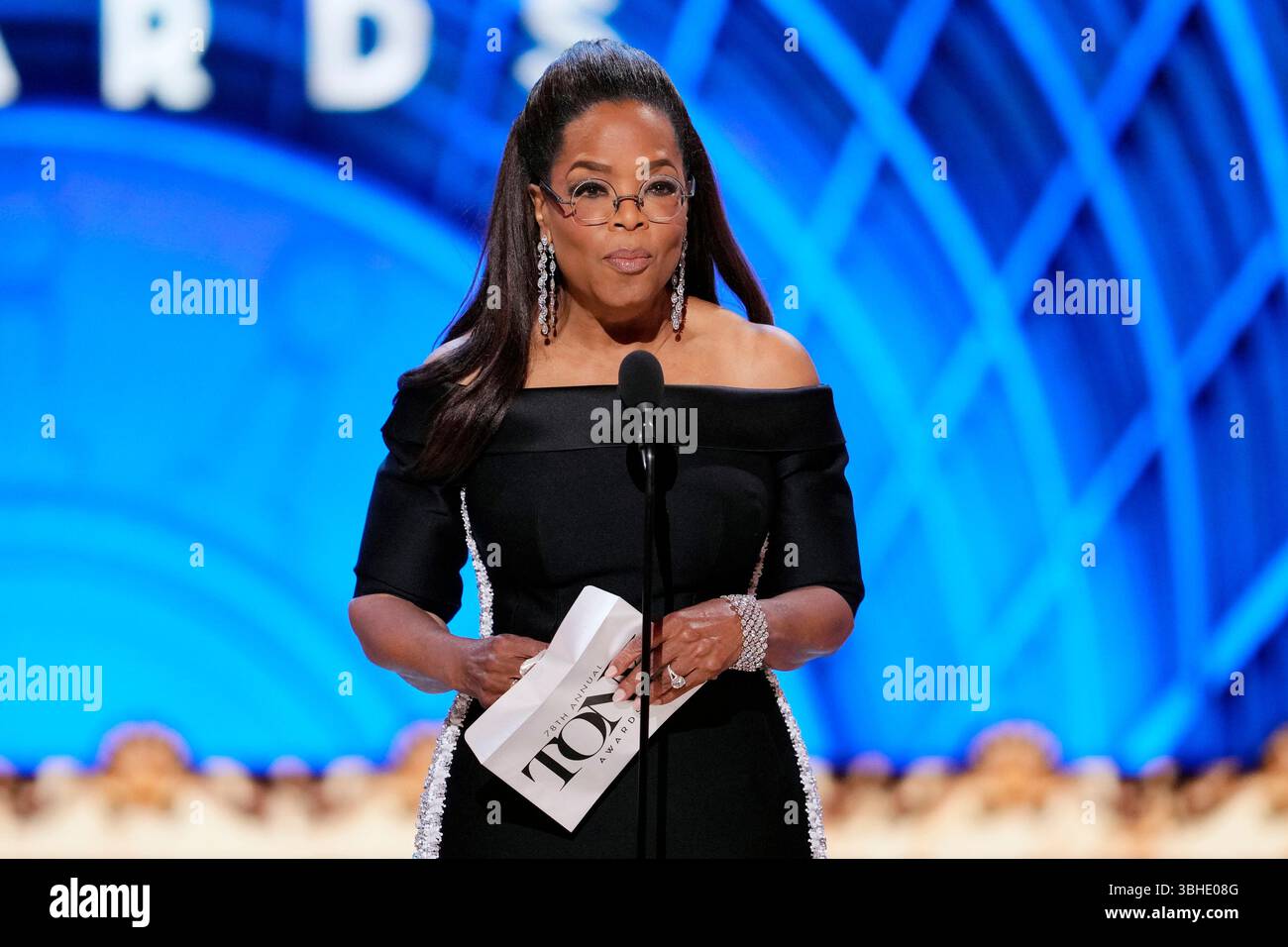 Oprah Winfrey presents the award for best performance by an actress in ...