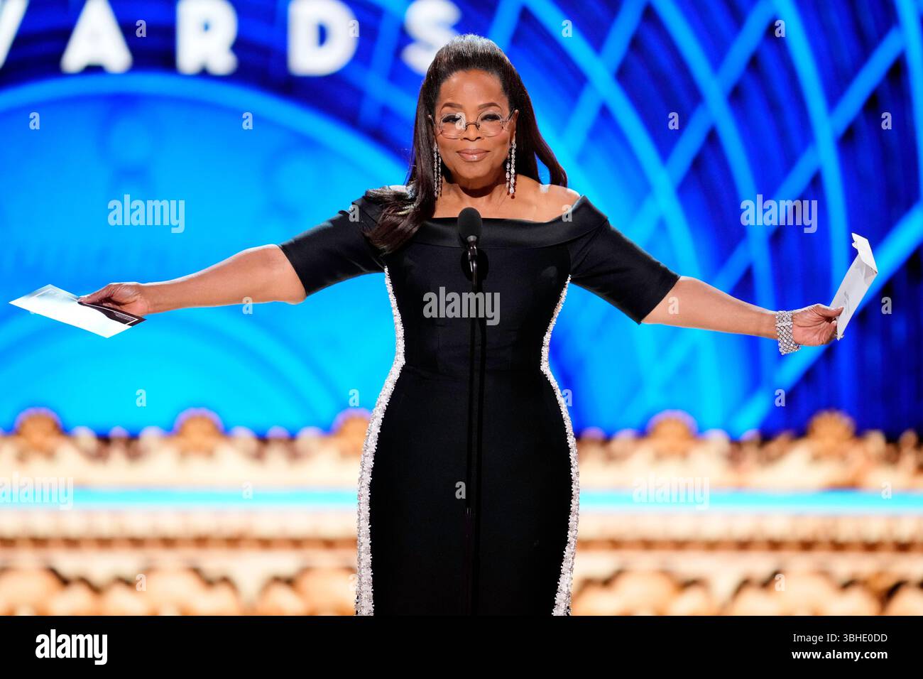 Oprah Winfrey presents the award for best performance by an actress in ...