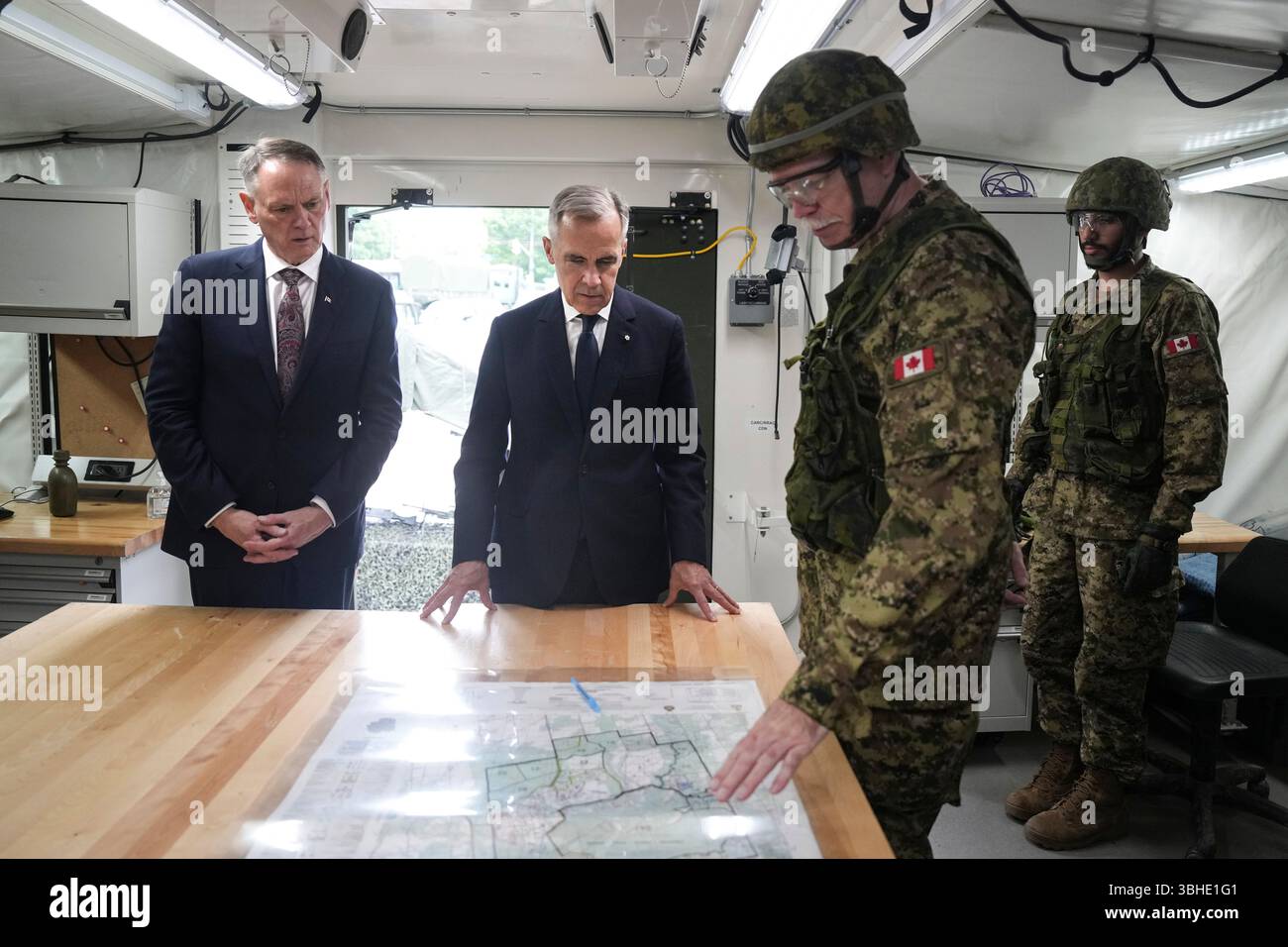 Canada Minister of National Defence David McGuinty, left to right, and ...