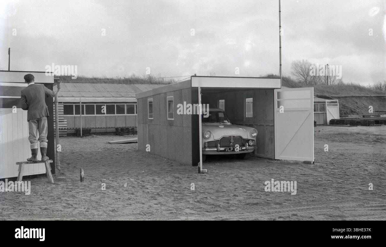 circa late 1950s, historical, prefab garages on display at business ...