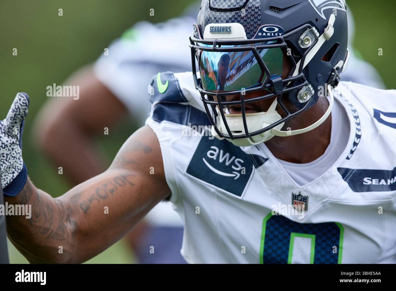 Seattle Seahawks defensive end DeMarcus Lawrence runs through drills ...