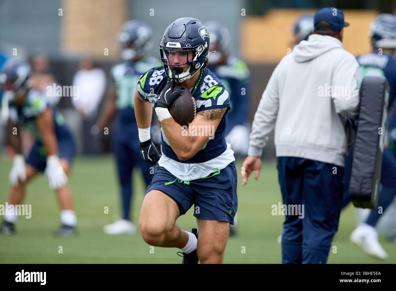 Seattle Seahawks tight end AJ Barner runs with the ball during NFL ...