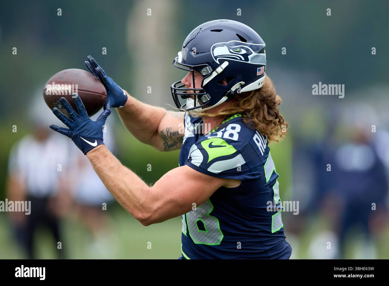 Seattle Seahawks tight end Brady Russell catches a pass during NFL football practice, Wednesday ...