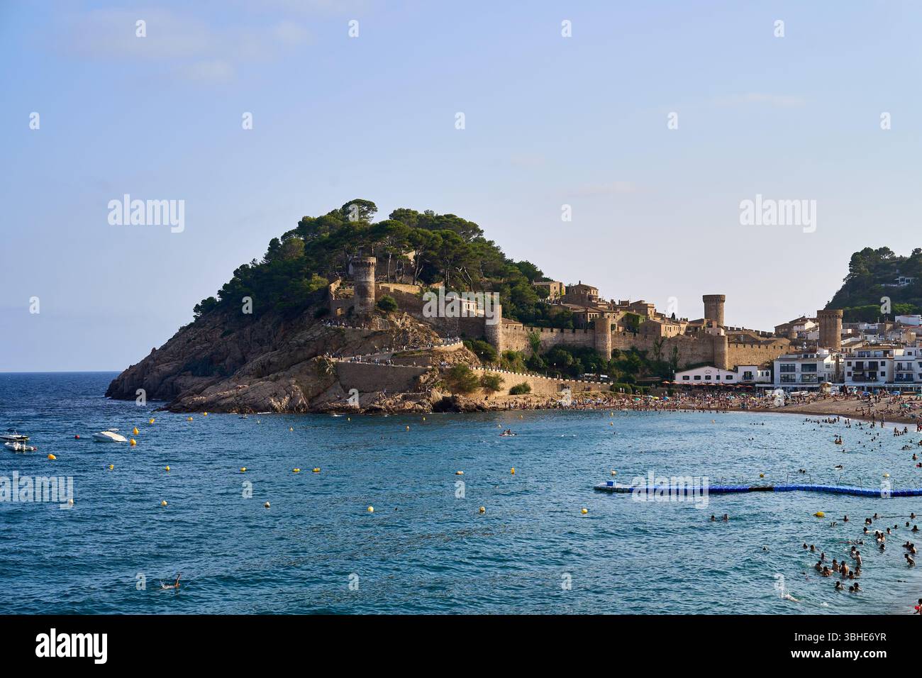 The medieval castle of Tossa de Mar stands majestically on the hill ...