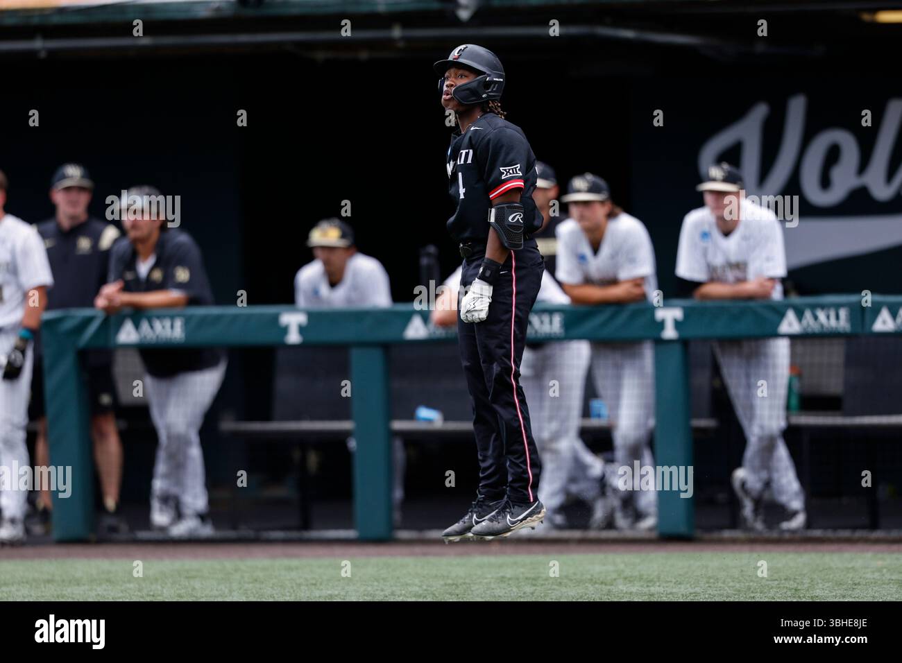 Cincinnati Bearcats right fielder Donovan Ford (4) jumps in celebration ...