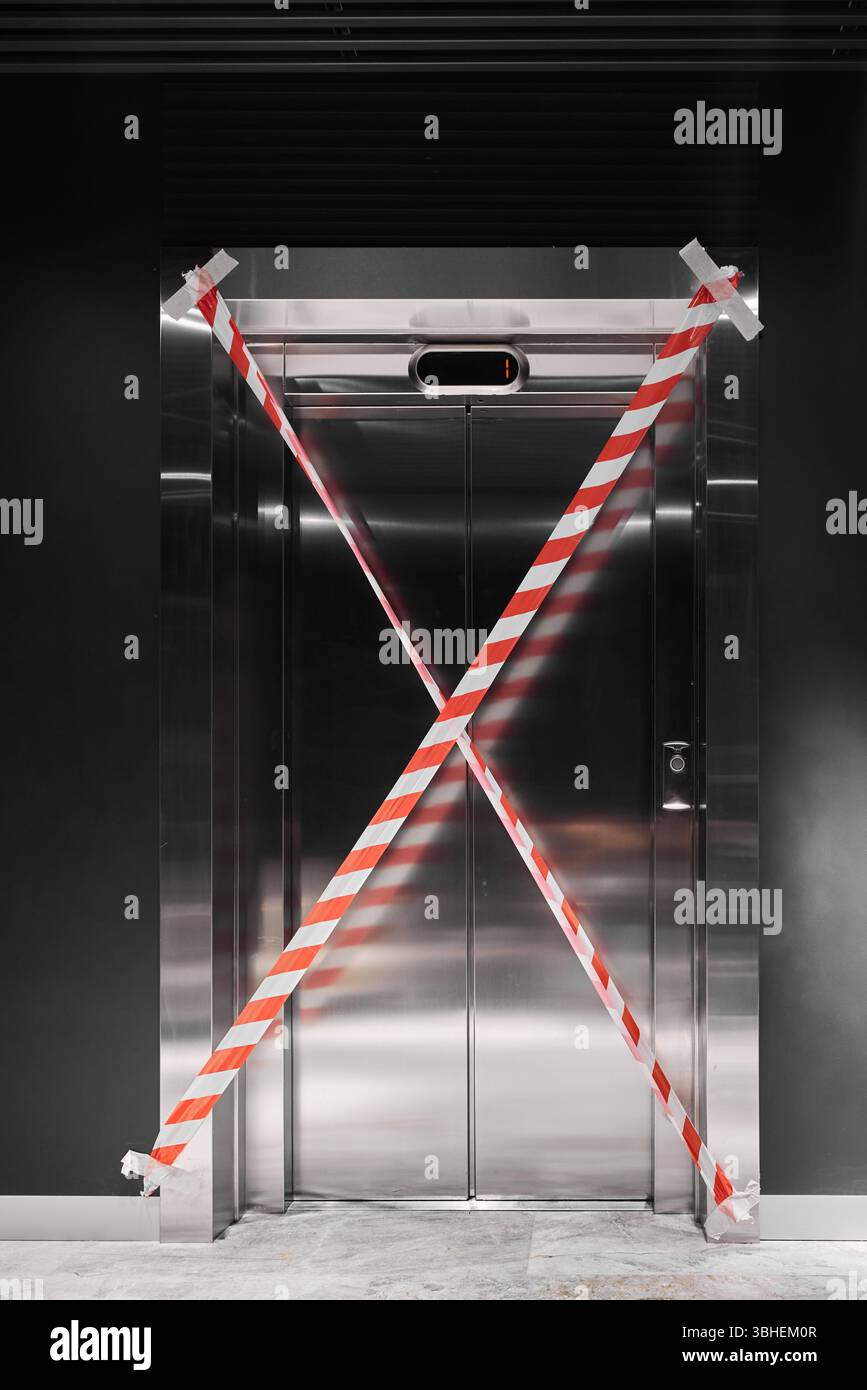 The elevator is currently out of service and is marked with barrier ...