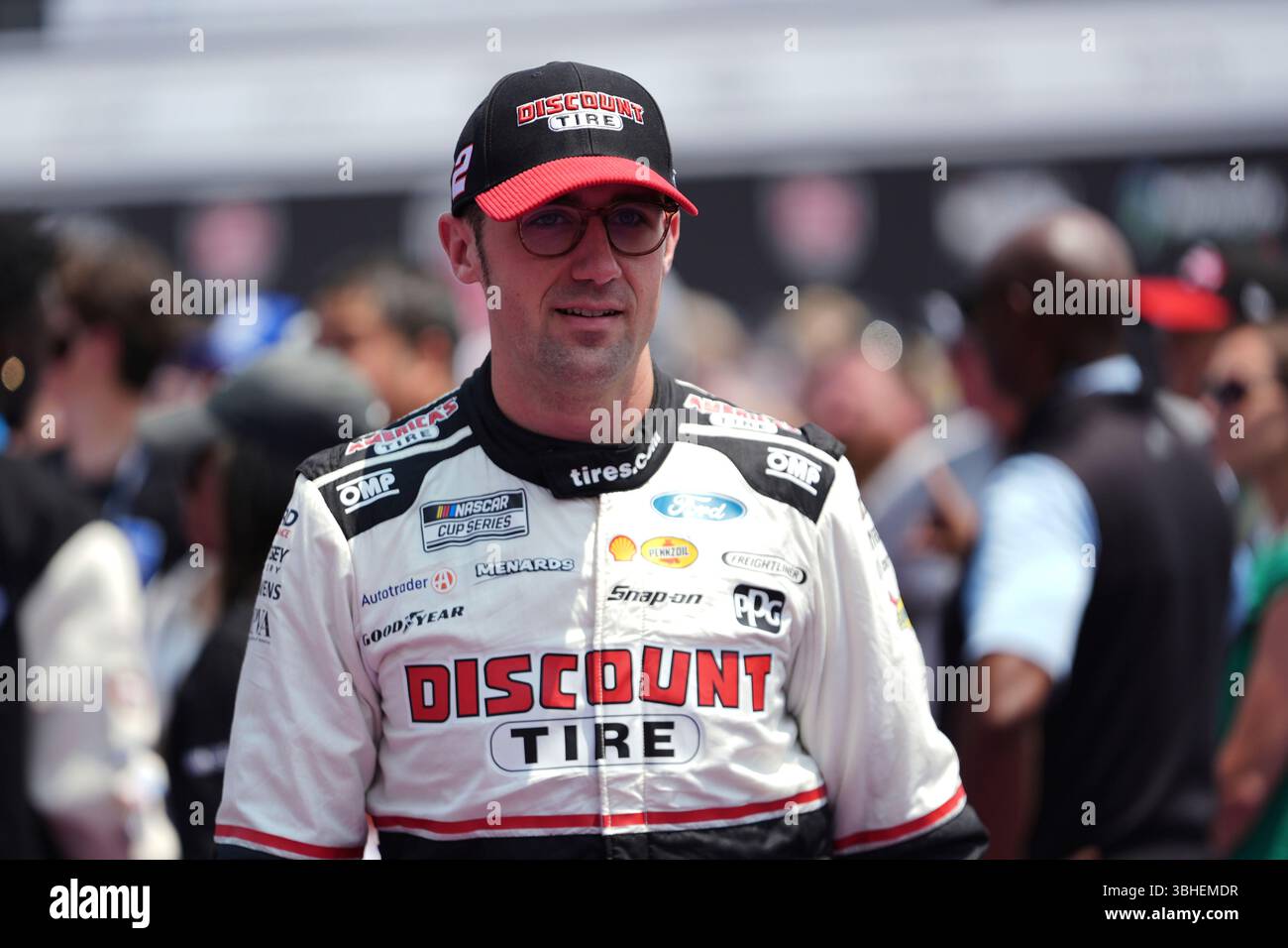Austin Cindric walks to his car before a NASCAR Cup Series auto race at ...
